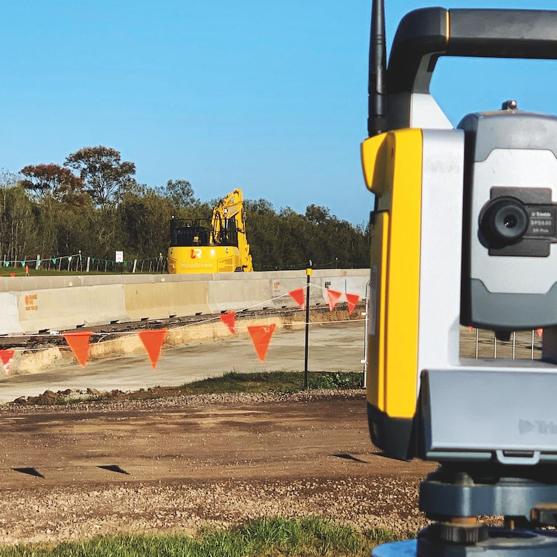 Technology, total stations and an excavator - Inside Construction